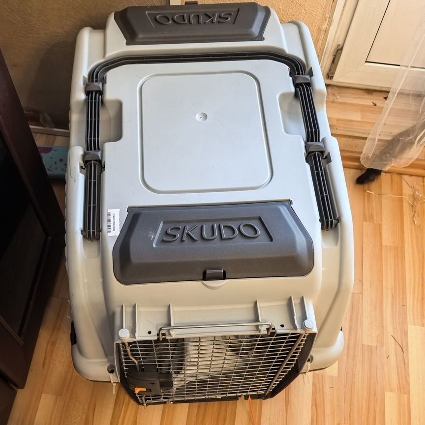 Контейнер для перевозки собак