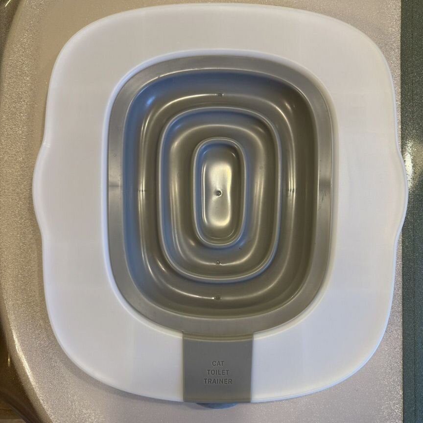 Система приучения кошек к унитазу